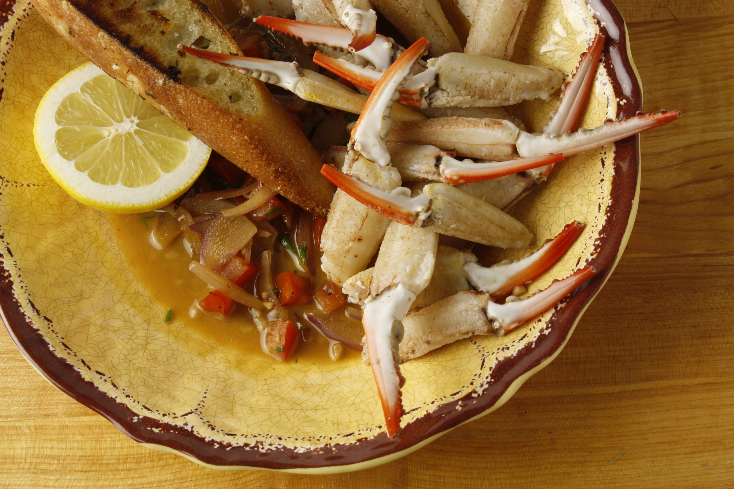 Crab Claws Sautéed in Garlic & White Wine - Handy Seafood